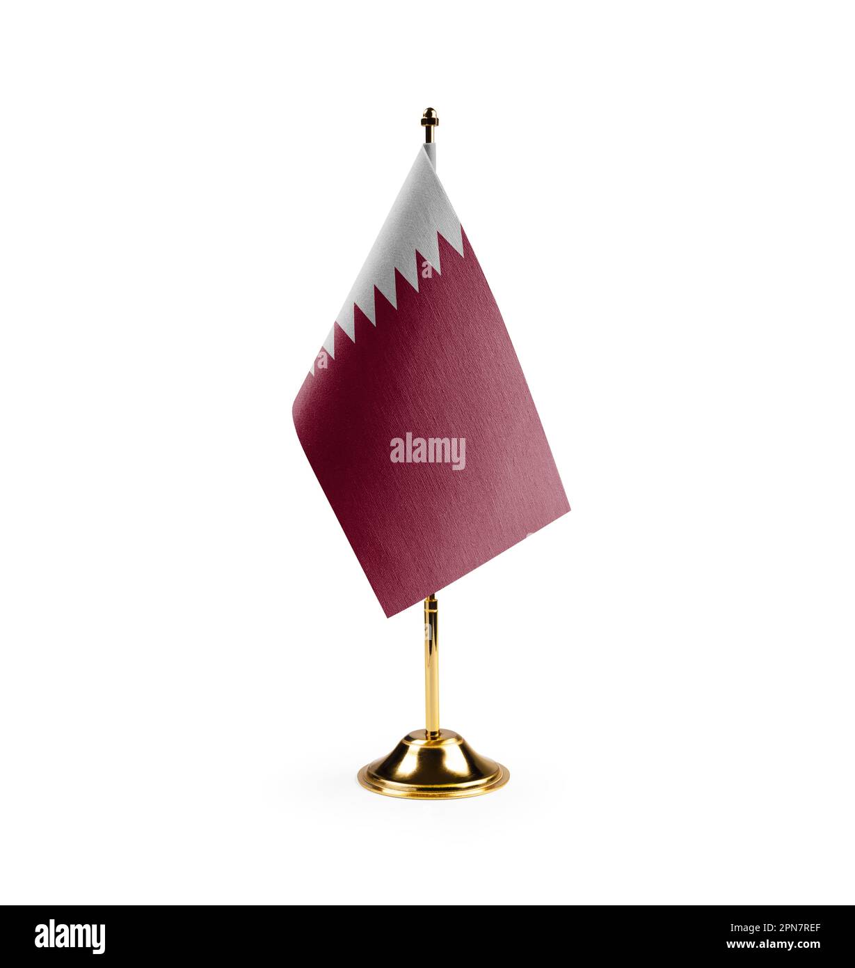 Small national flag of the Qatar on a white background Stock Photo - Alamy