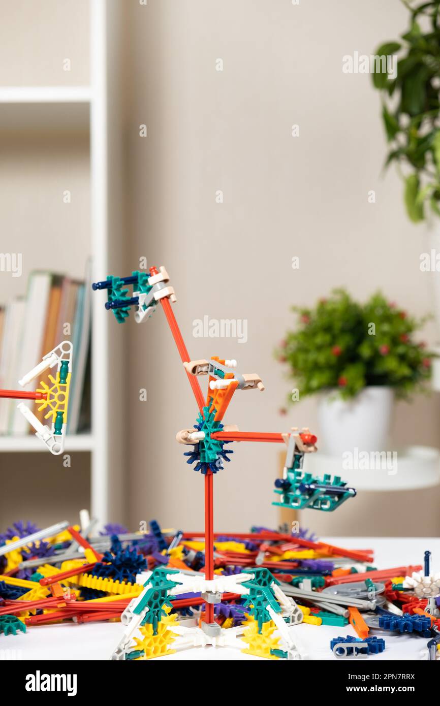 Children's constructor of gears cogwheel and sticks in the children's ...