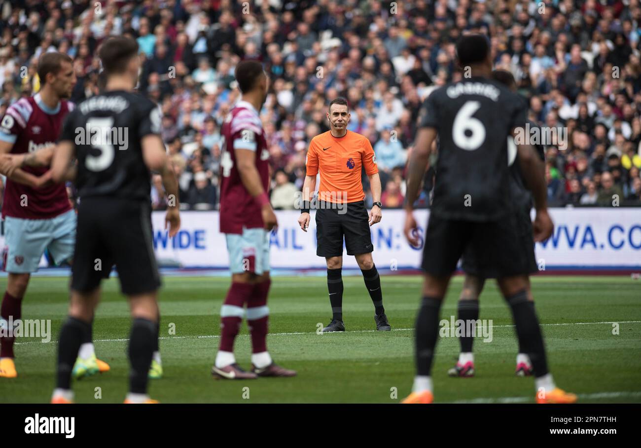 Referee David Coote looks on during the match. Premier League match ...