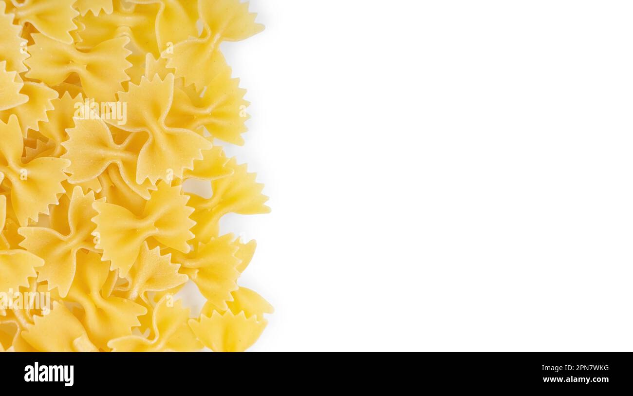 Farfalle spaghetti pattern, food background. Scattered raw pasta ...