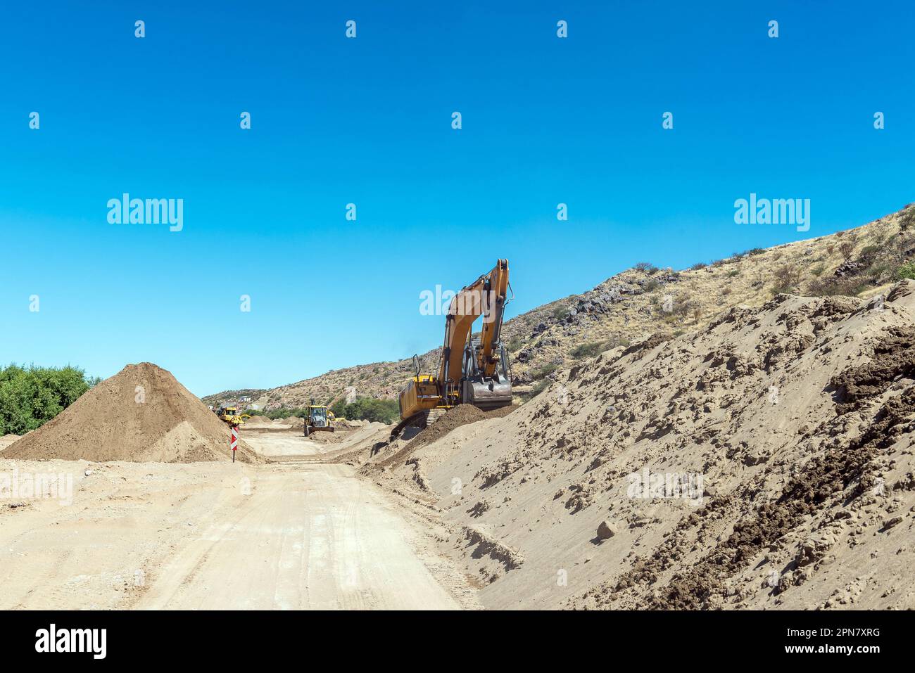 Boegoeberg Dam, South Africa - Feb 28 2023: Backhoe loaders clearing ...