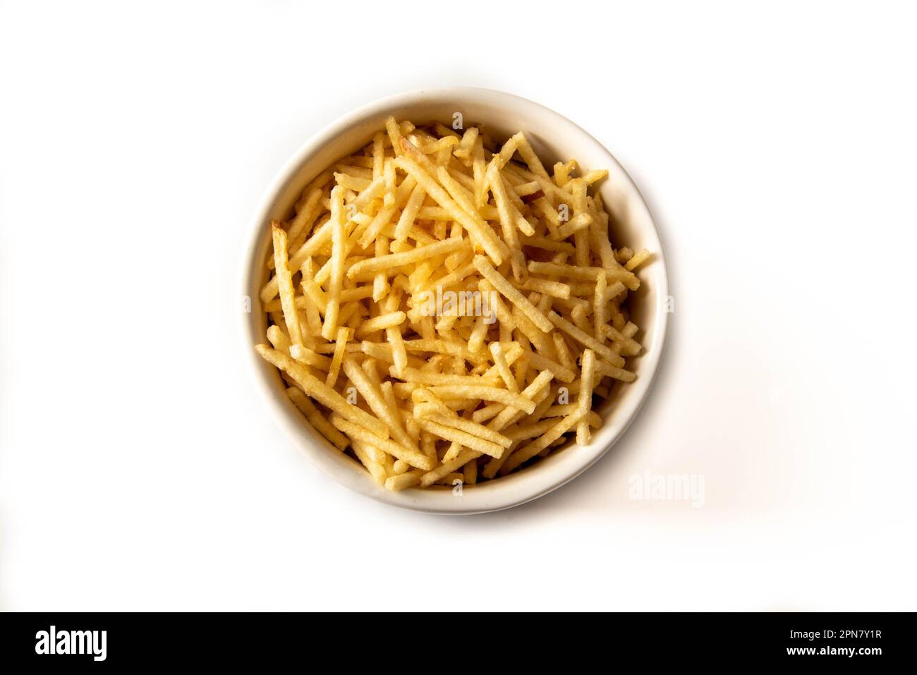 Potato straw or potato straw in a bowl isolated over white background ...