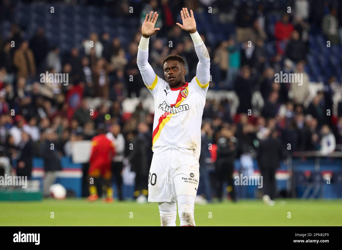 Paris, France. 15th Apr, 2023. Lens goalkeeper Brice Samba salutes the ...