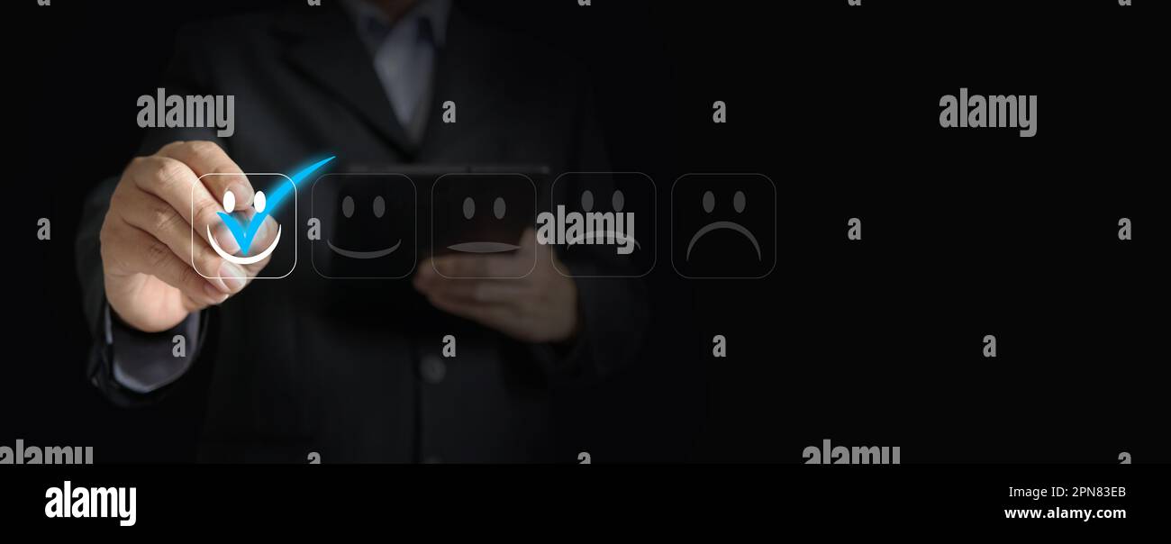 A Businessman's Hand Holds a Stylus, Marking the Perfect 'Tick' on One ...