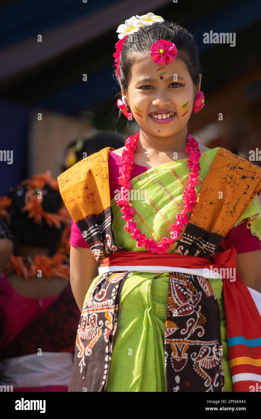 An Indian Bengli girl child with colorful face and tradition dress in ...
