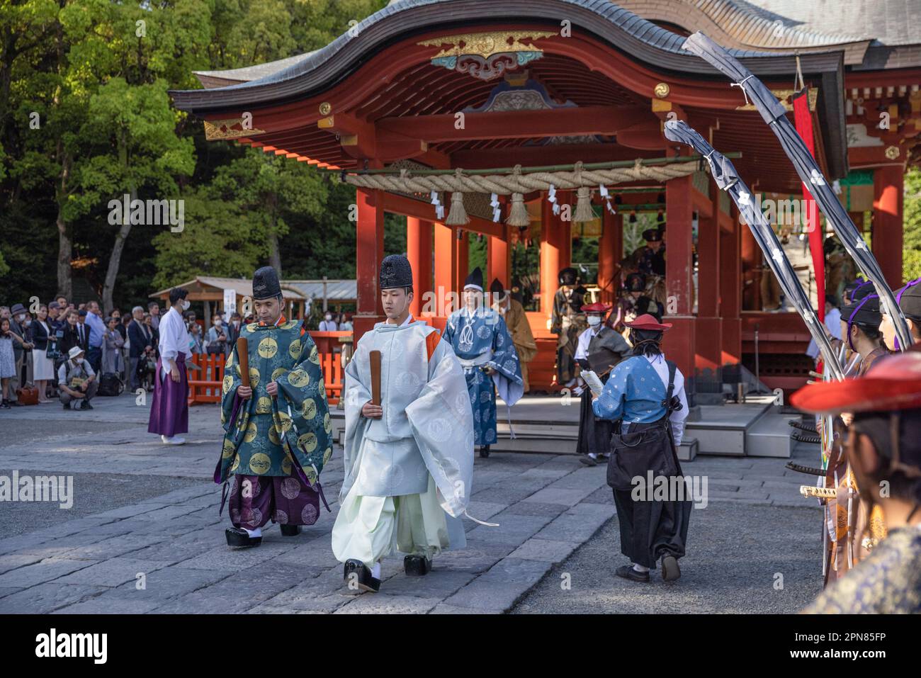 Kamakura, Japan. 16th Apr, 2023. Shinto priests leave the victory ...