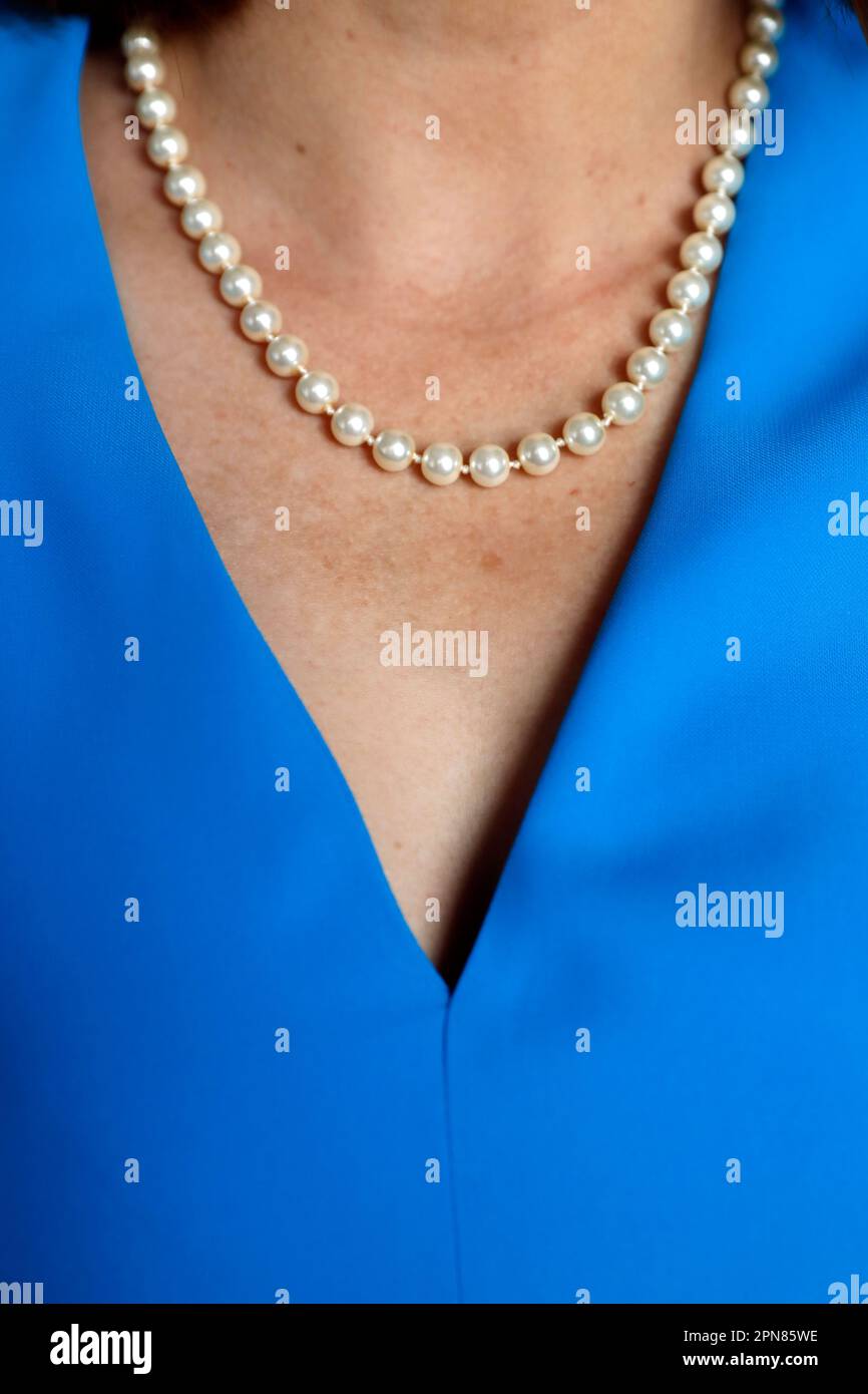 Wearing a blue dress hi-res stock photography and images - Alamy