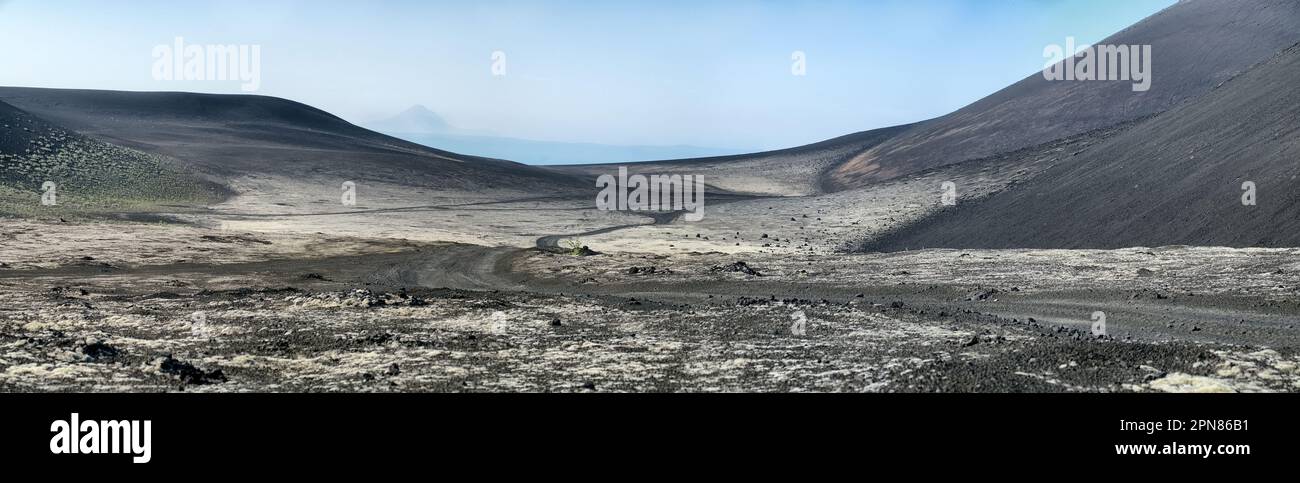 Cinder road, auto travel through volcanic plateau on eruptions of ...