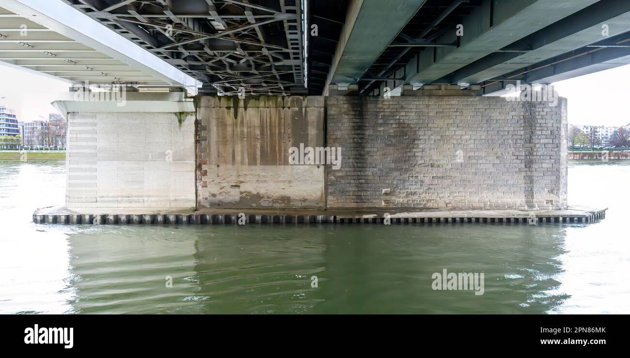 The succession of bridge piers in the Rhine River at Mannheim, Germany ...