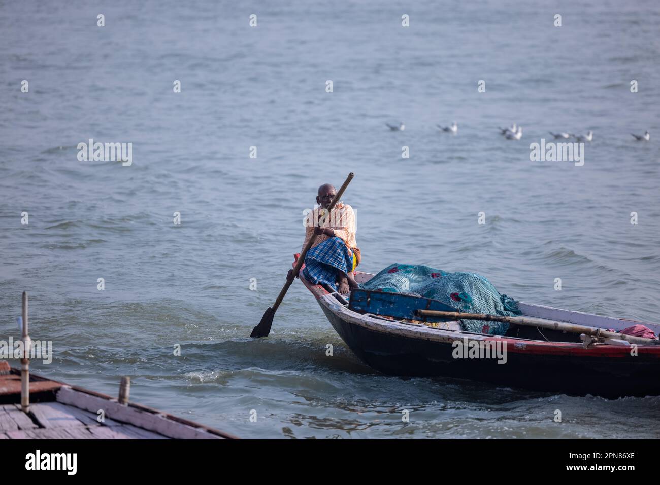 Varanasi, Uttar Pradesh, India - November 2022: Tourists enjoying boat ...