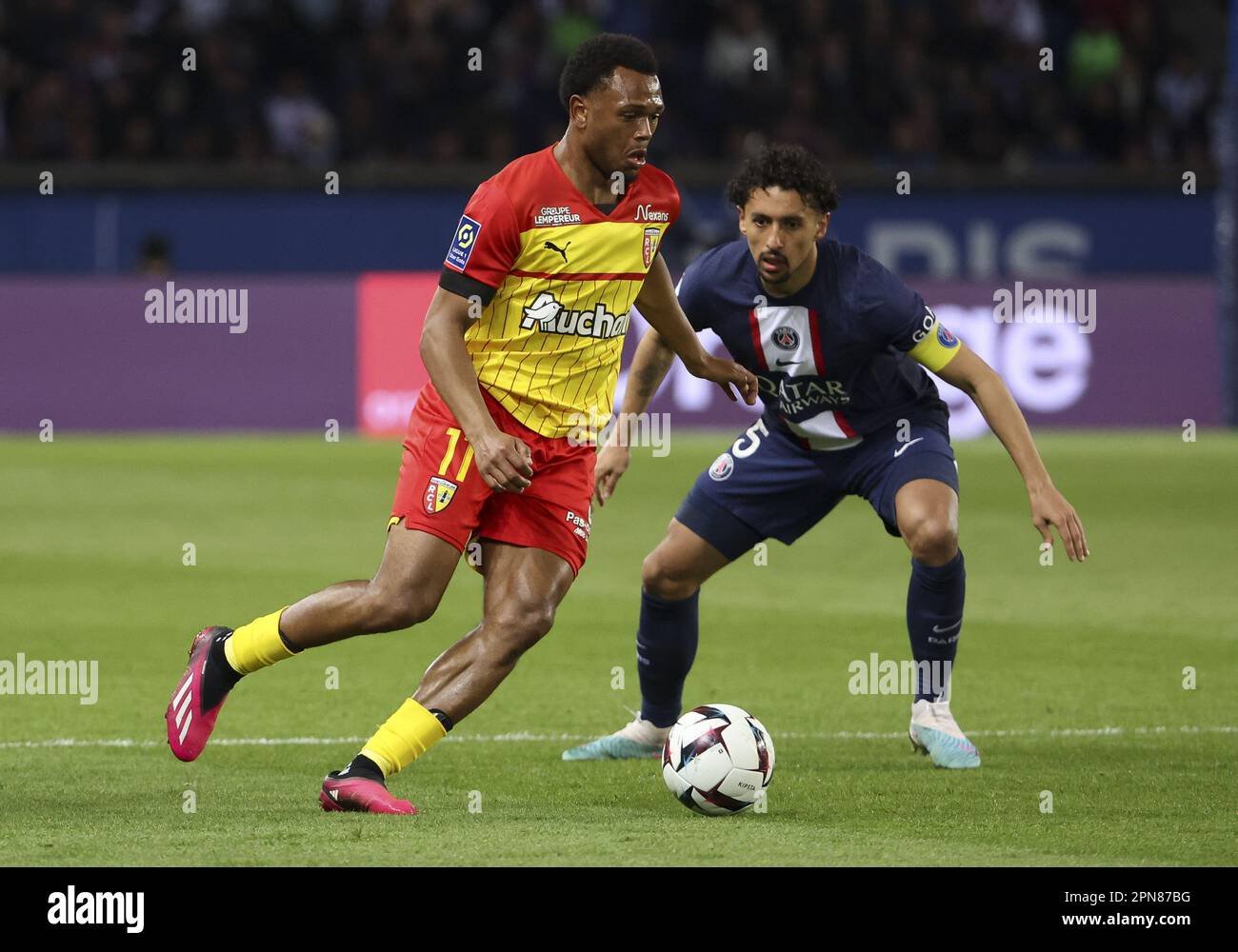 Lois Openda of Lens, Marquinhos of PSG during the French championship ...