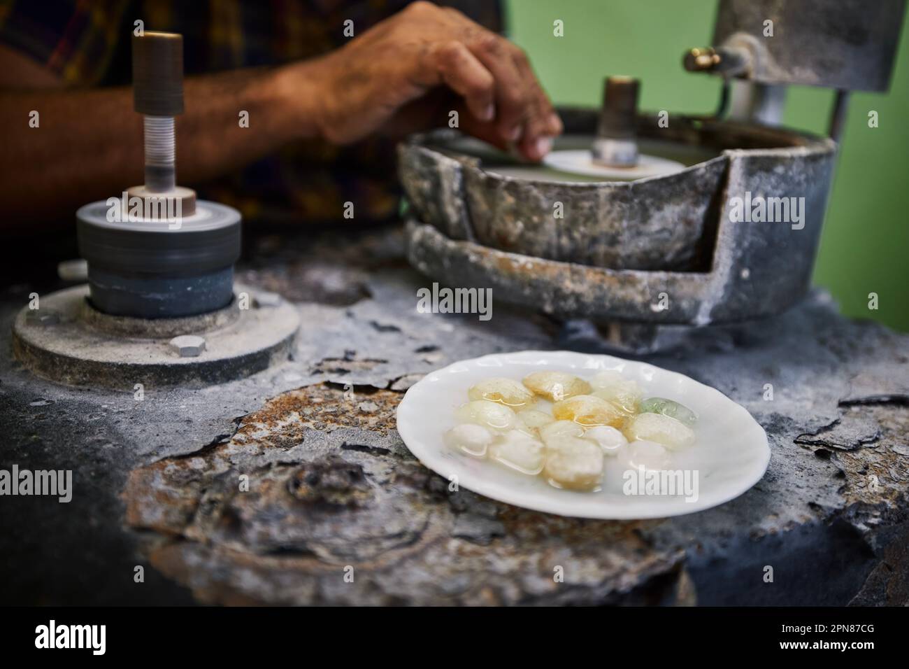 Jeweler is processing Moonstone, which is mined from mine in Sri Lanka ...