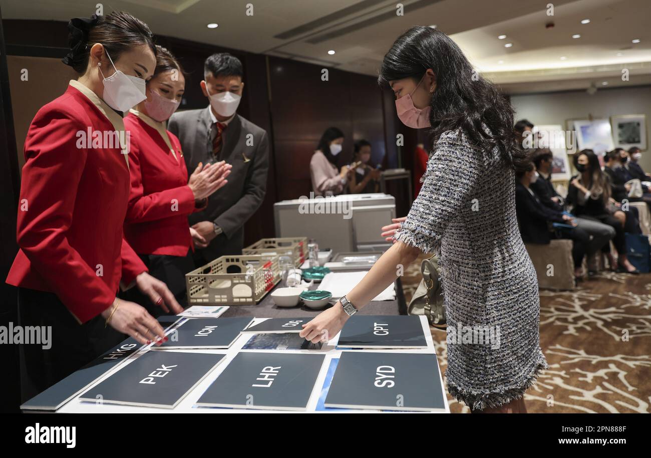 A job seeker attends Cathay Pacific Flight Attendant Recruitment Day at ...