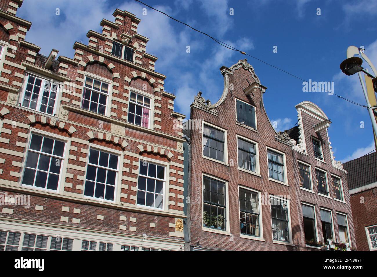 old brick houses in amsterdam (the netherlands Stock Photo - Alamy