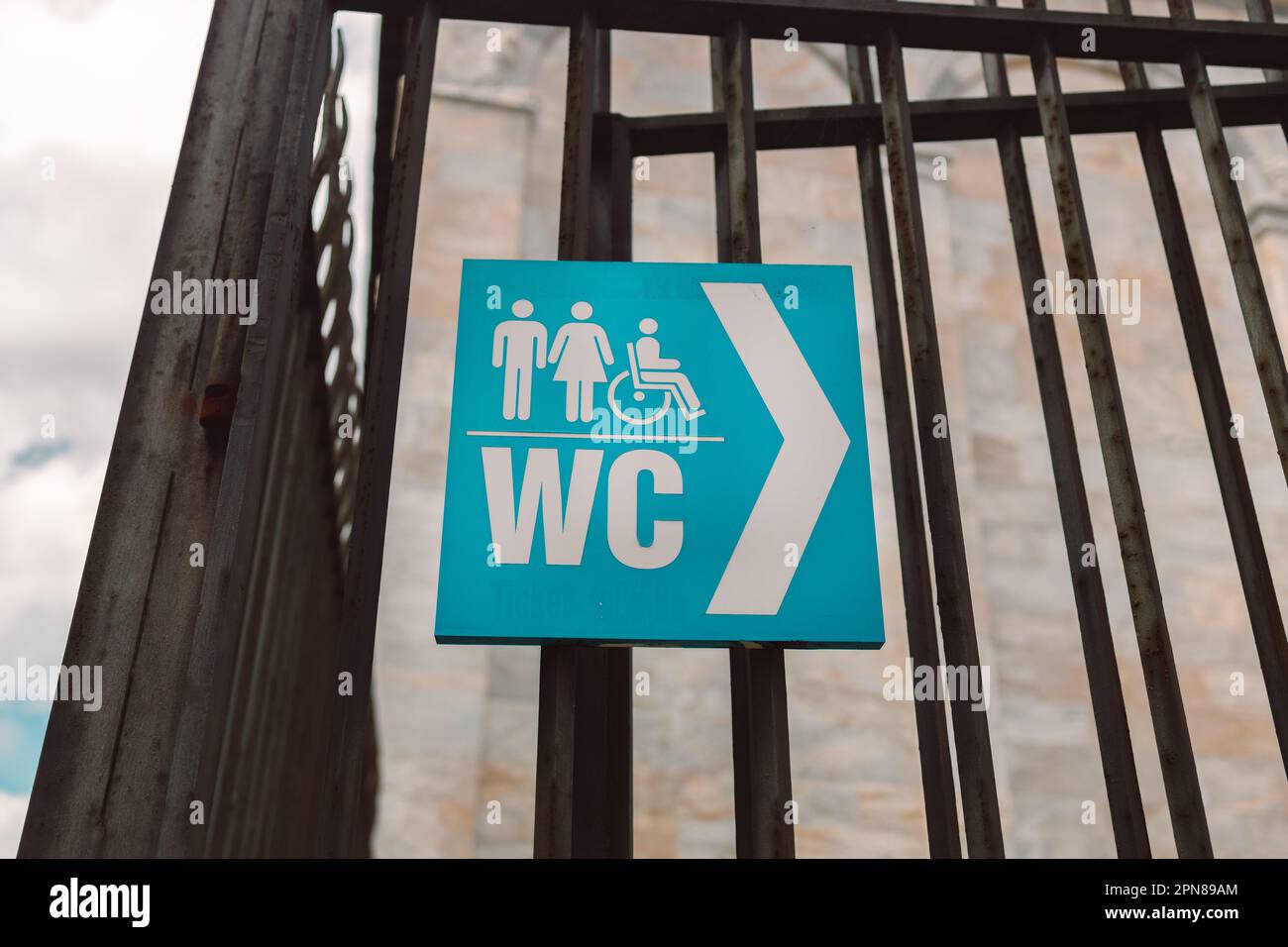 Modern men and women public toilet or restroom sign on the wall with ...
