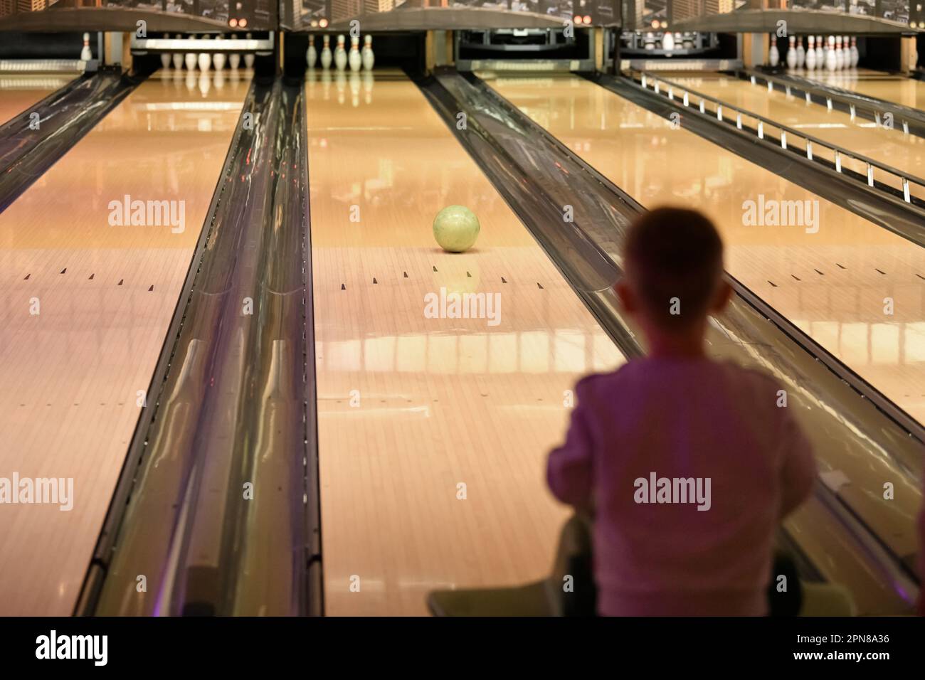 Bowling slide alley for kids and lanes Stock Photo - Alamy