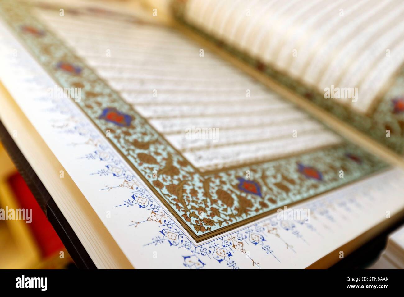 Open Holy Quran in arabic Stock Photo - Alamy