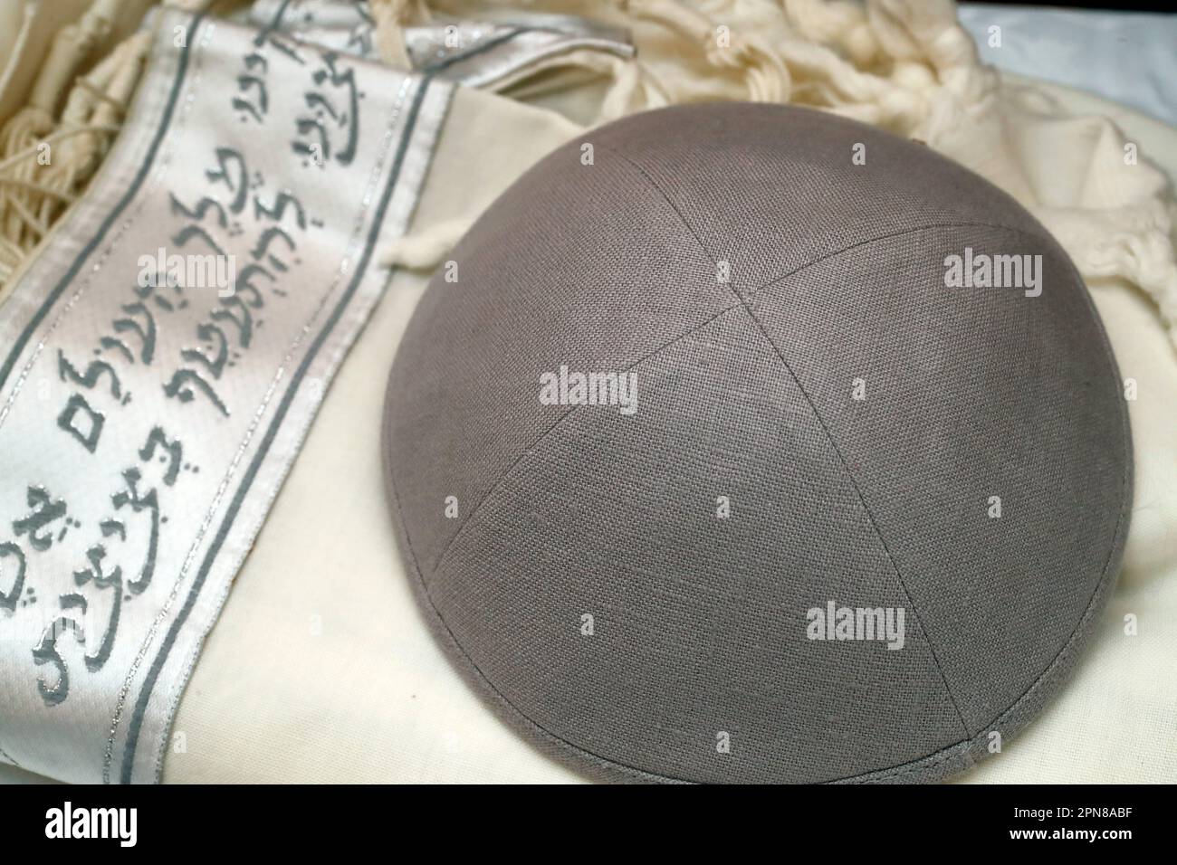 Kippah jewish cap on a tallit prayer shawl Stock Photo - Alamy