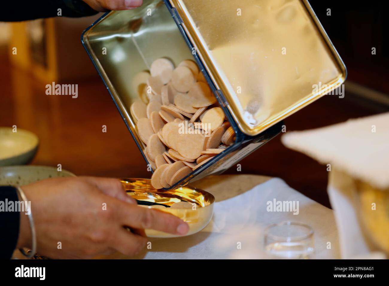 Communion wafers hi-res stock photography and images - Alamy