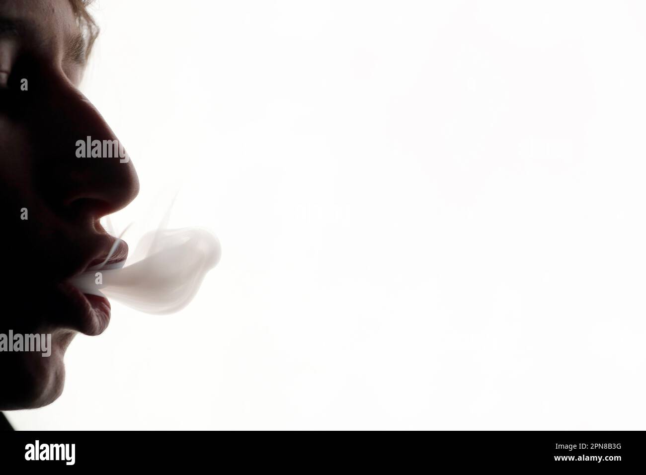 Profile Silhouette of a Man Smoking on White Background Stock Photo - Alamy