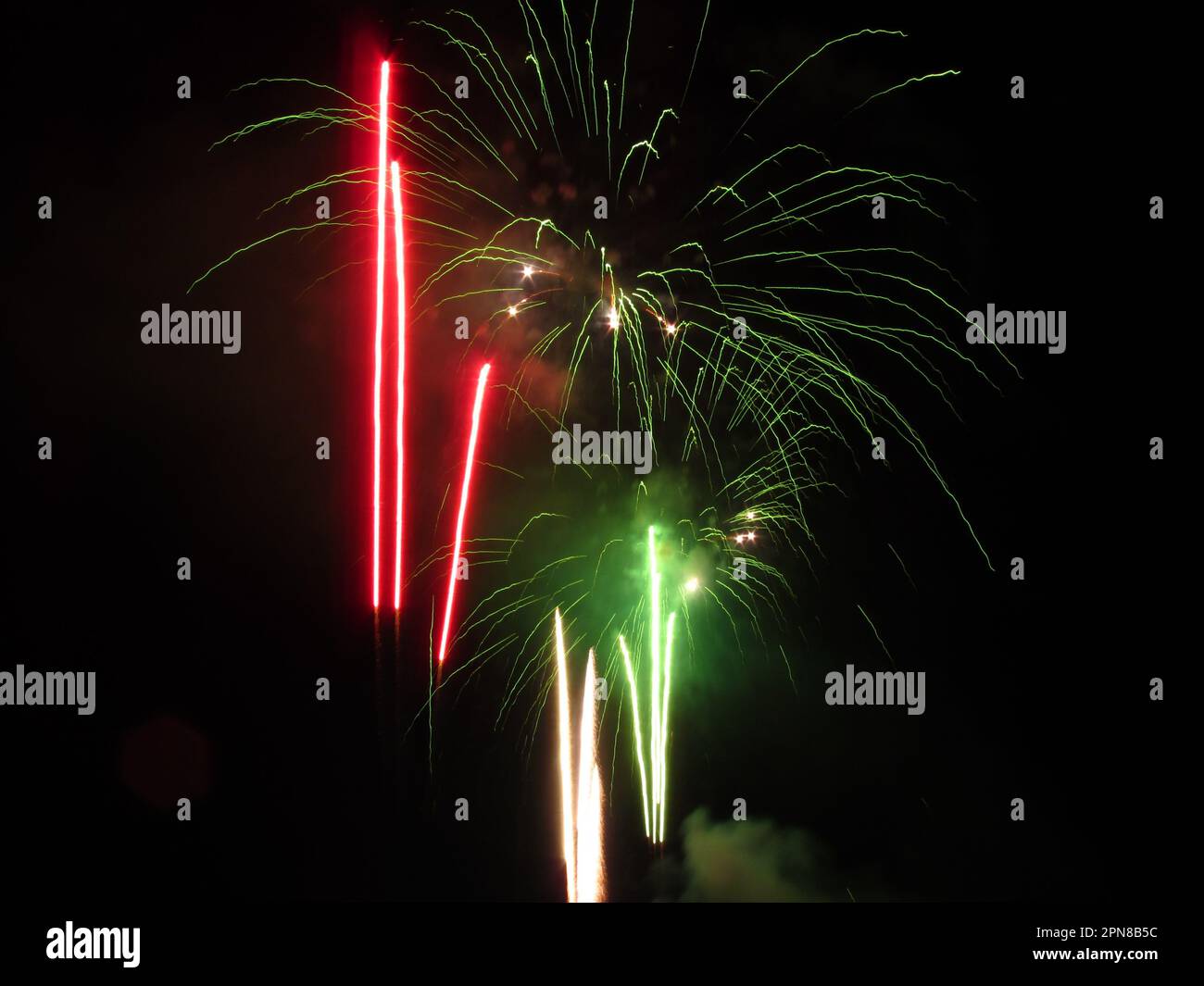 Colorful fireworks of various colors light up the night sky Stock Photo ...