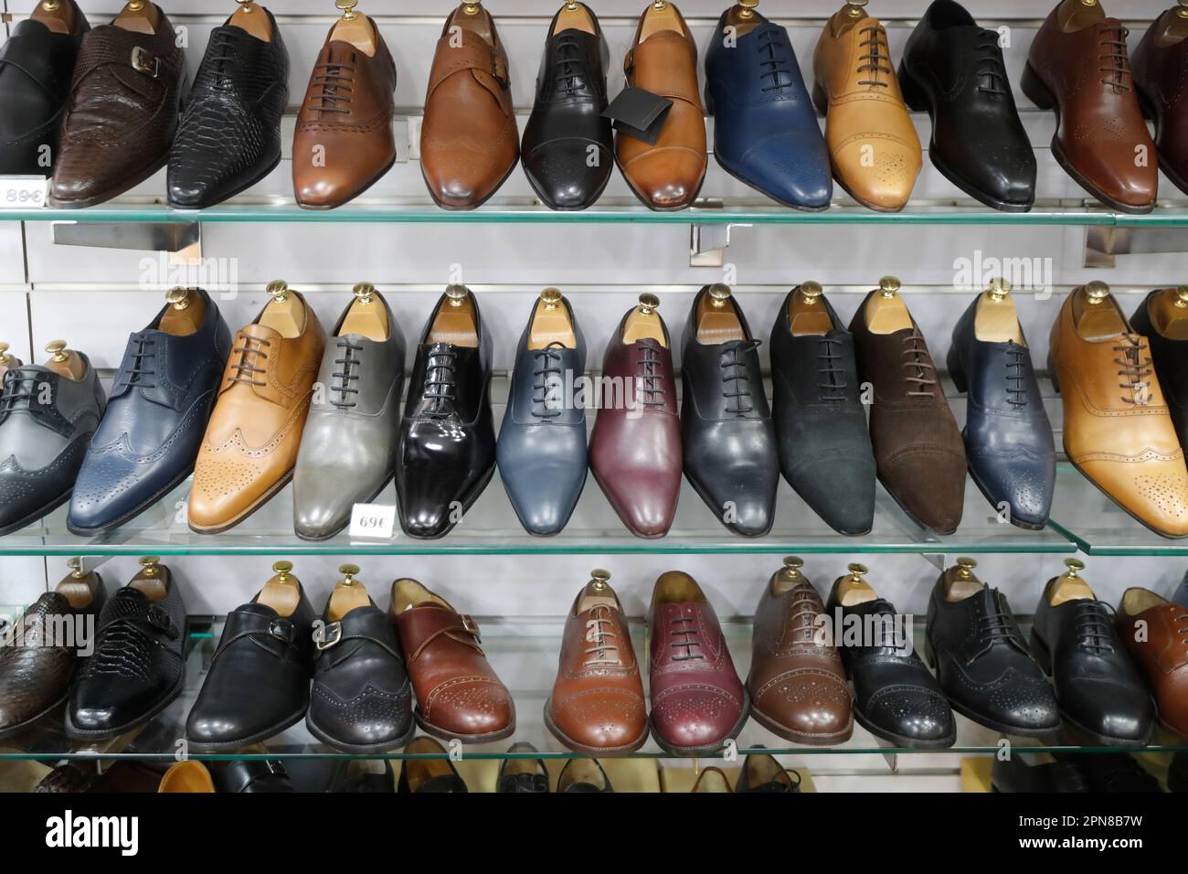 Elegant shoes in a man clothing store Stock Photo - Alamy
