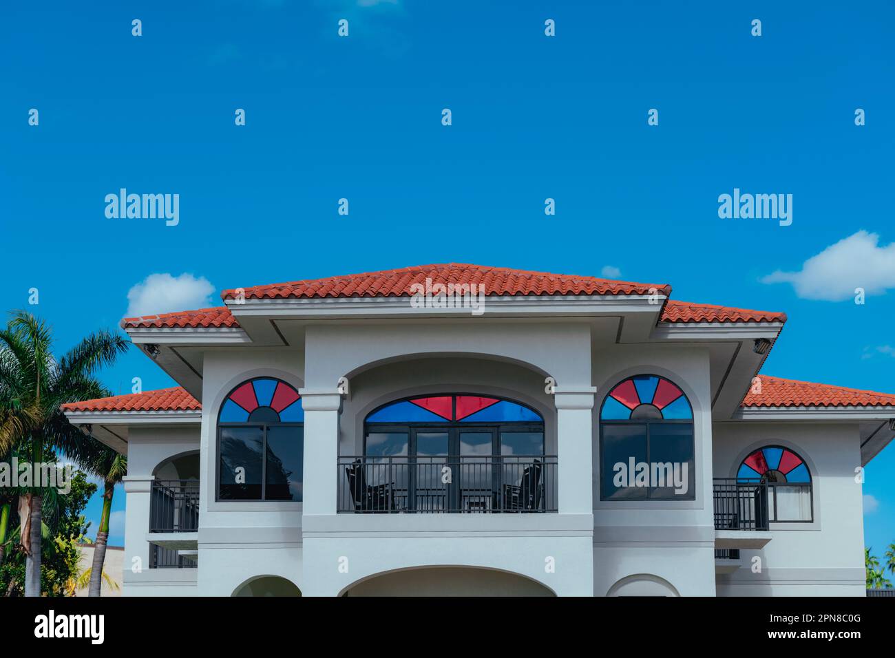 A traditional two-story house with white exterior Stock Photo - Alamy
