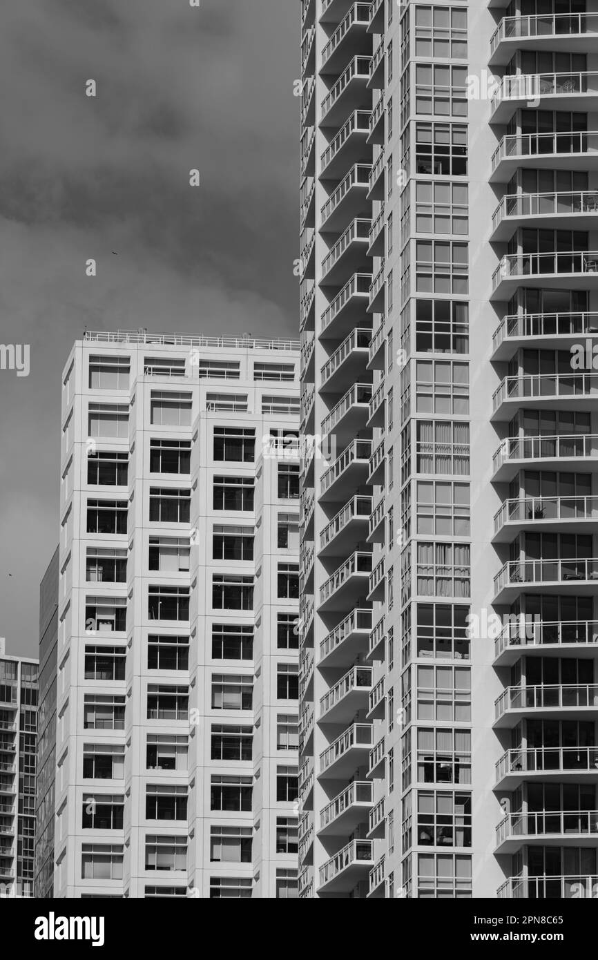 A modern residential apartment complex located in an urban cityscape in ...