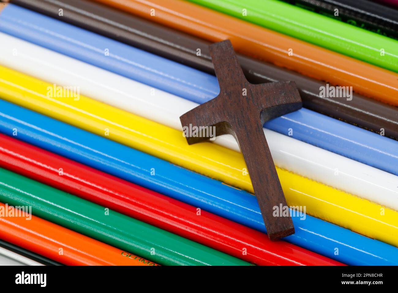Christian cross and colored pencils. Catechism. Christian curch Stock ...