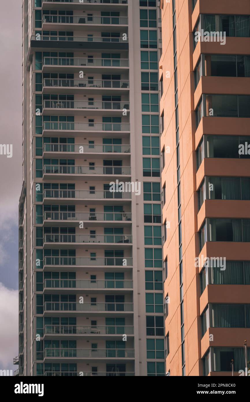 A modern, contemporary architecture apartment complex, featuring sleek ...