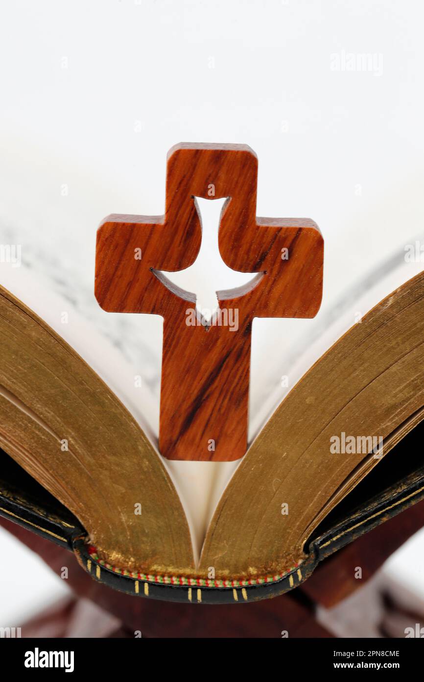 Open bible with christian cross and dove holy spirit. Faith and ...