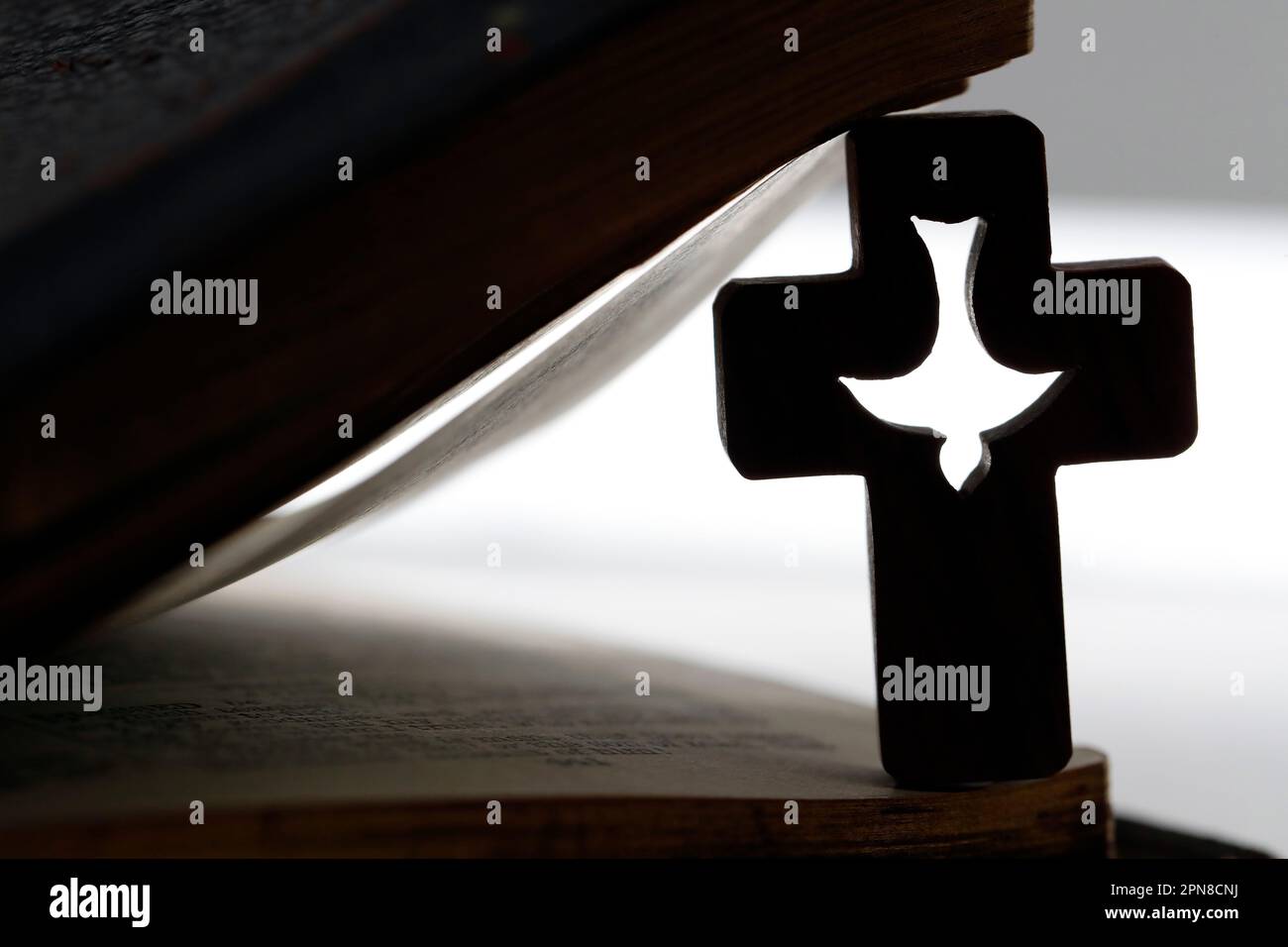 Holy bible with christian cross and dove holy spirit. Faith and ...