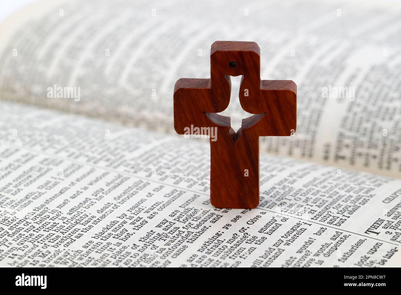 Open bible with christian cross and dove holy spirit Stock Photo - Alamy