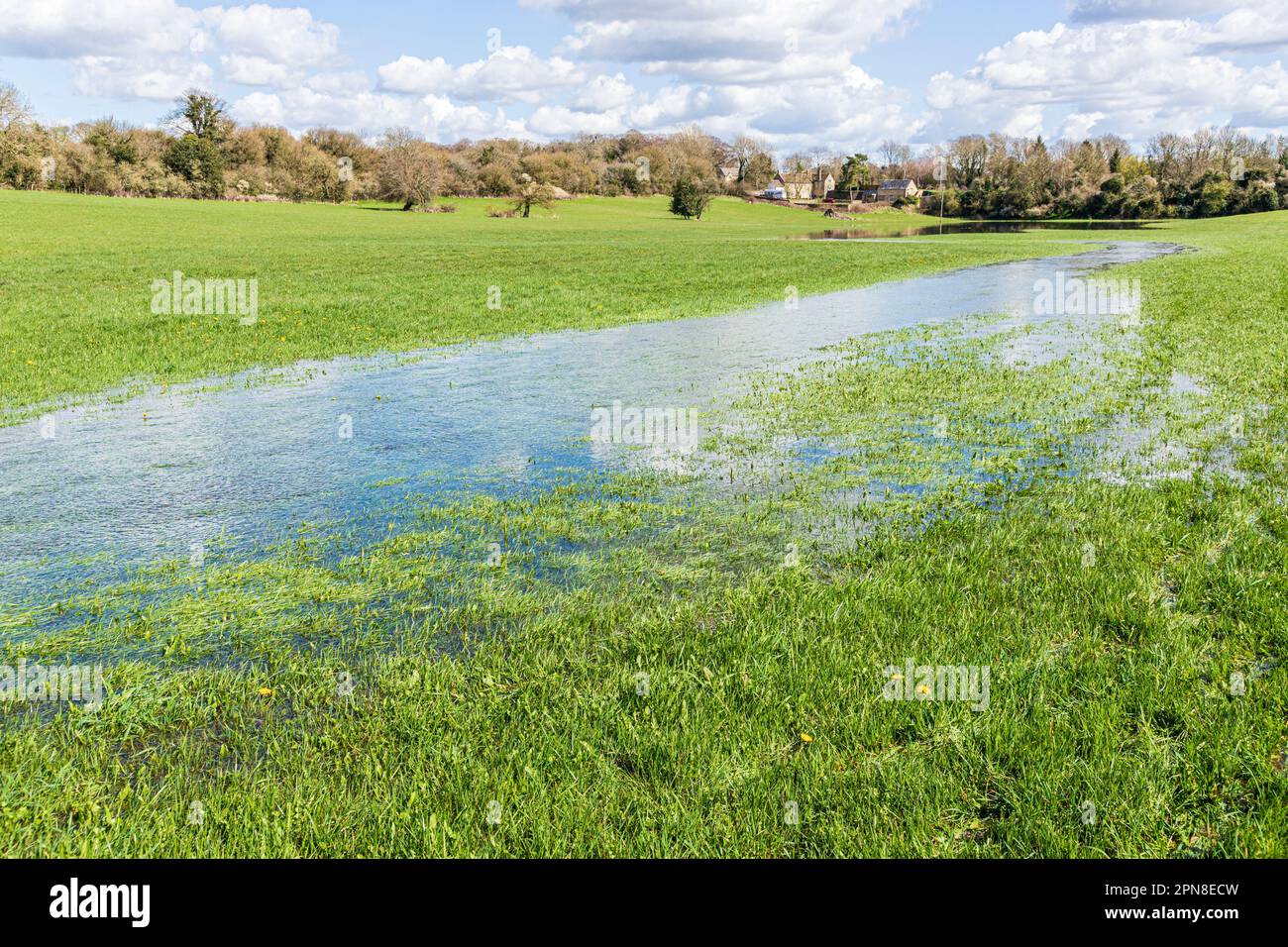 The Thames Path long distance walking trail beside the infant River ...