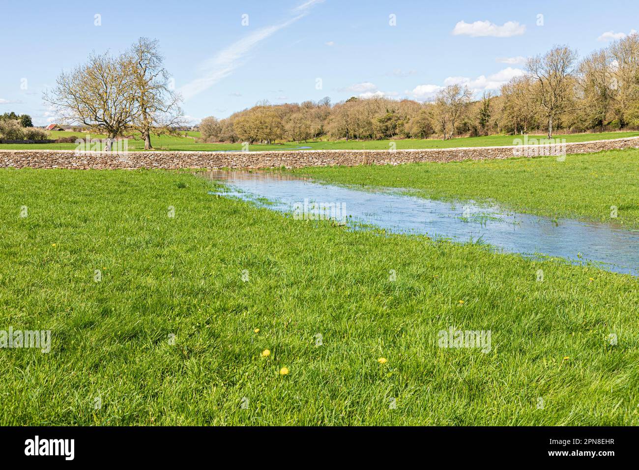 The Thames Path long distance walking trail beside the infant River ...