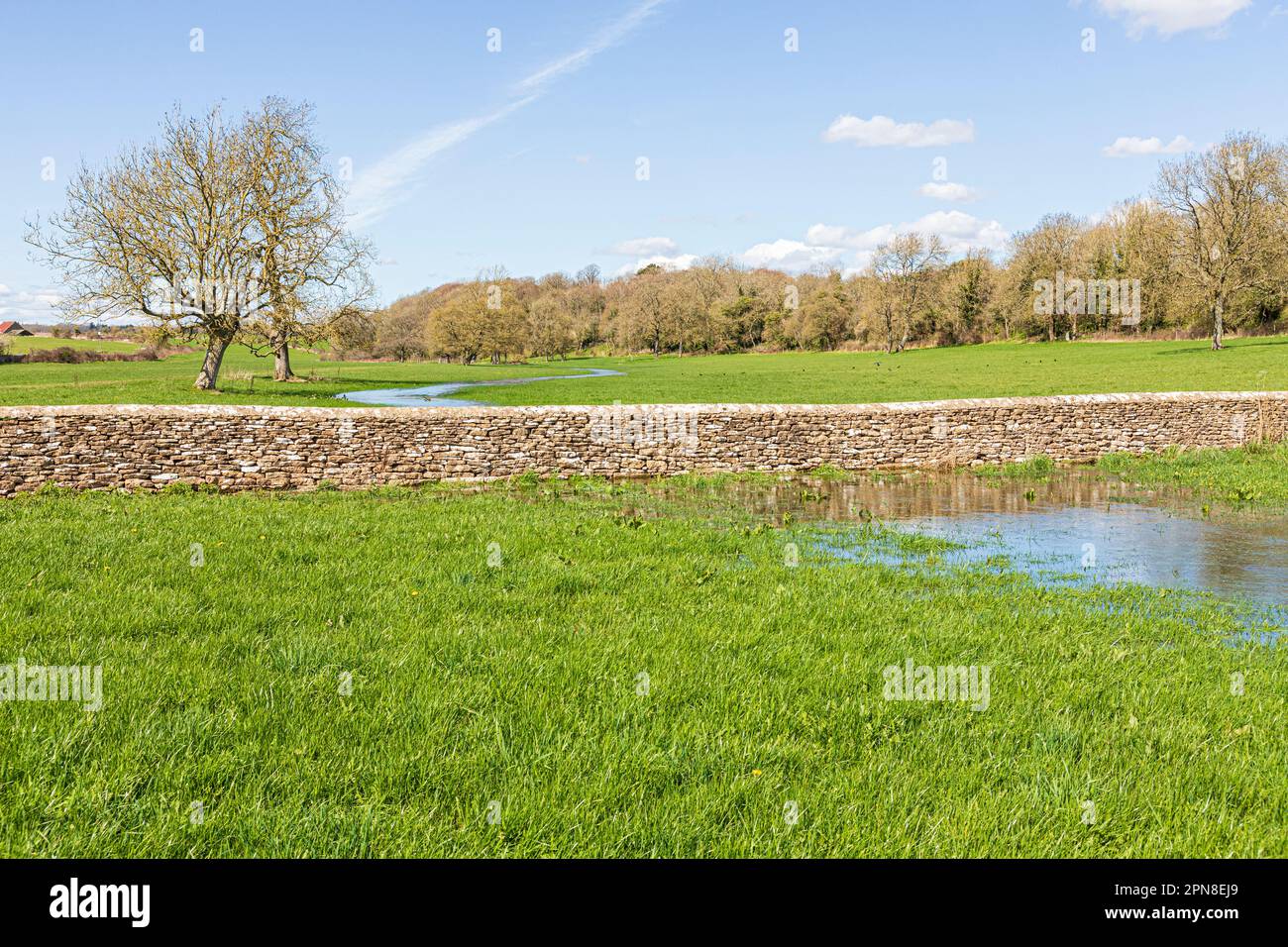The Thames Path long distance walking trail beside the infant River ...