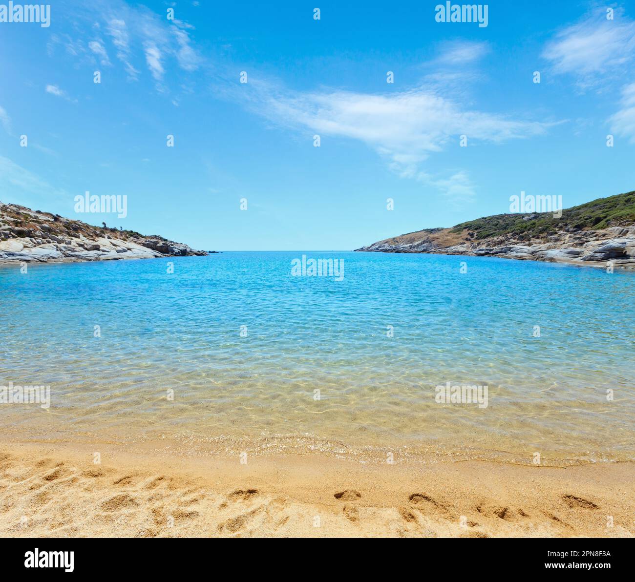 Summer sea scenery with aquamarine transparent water and sandy Agridia ...