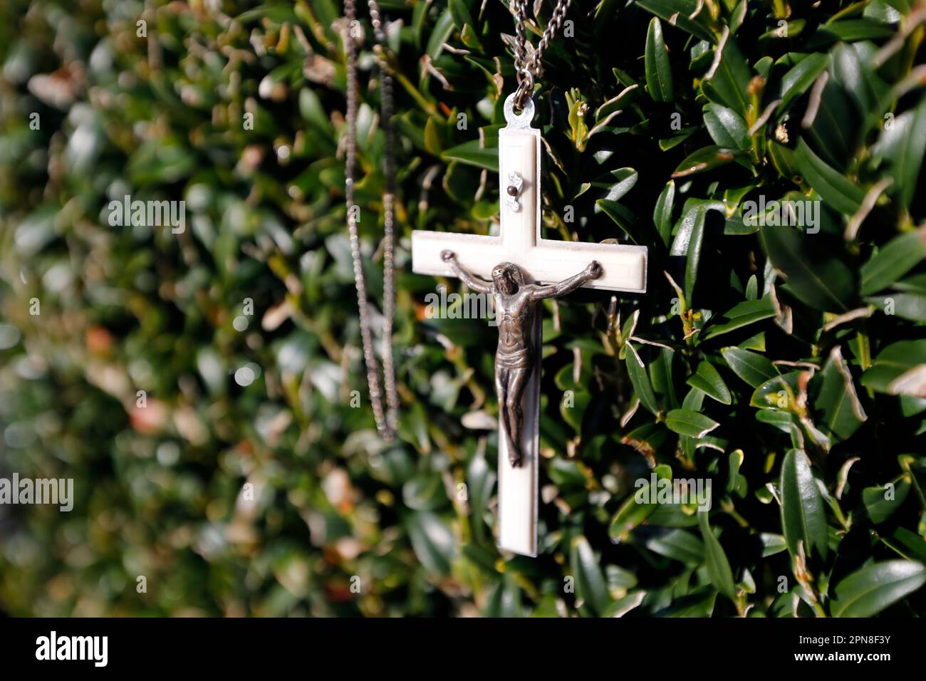 Pendant with Jesus christ crucified. Crucifix Stock Photo - Alamy