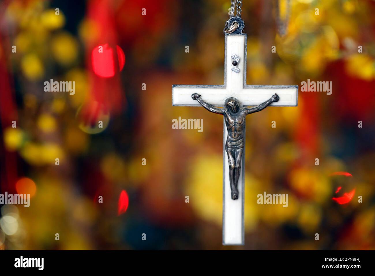 Pendant with Jesus christ crucified. Crucifix Stock Photo - Alamy