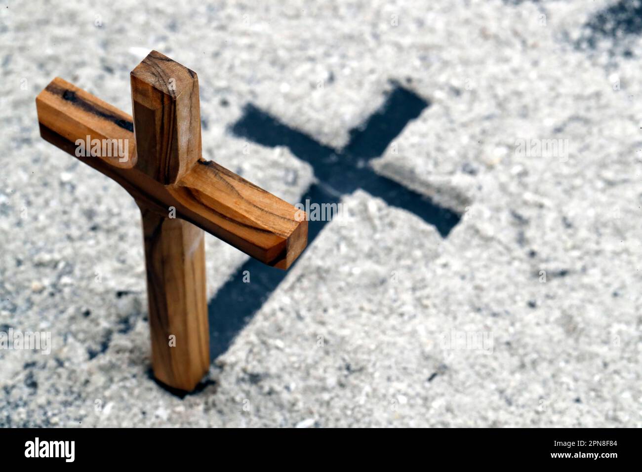Ashes and wooden christian cross. Ash Wednesday celebration. Lent ...