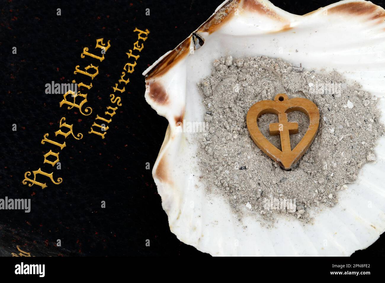 Bible and scalllop shell with ashes. Ash Wednesday. Lent season Stock ...