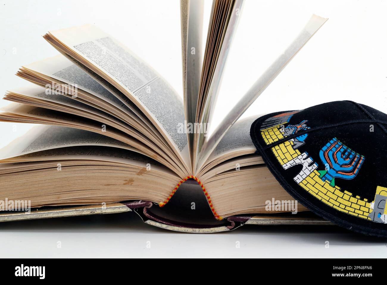 Kippah jewish cap and Torah book Stock Photo - Alamy