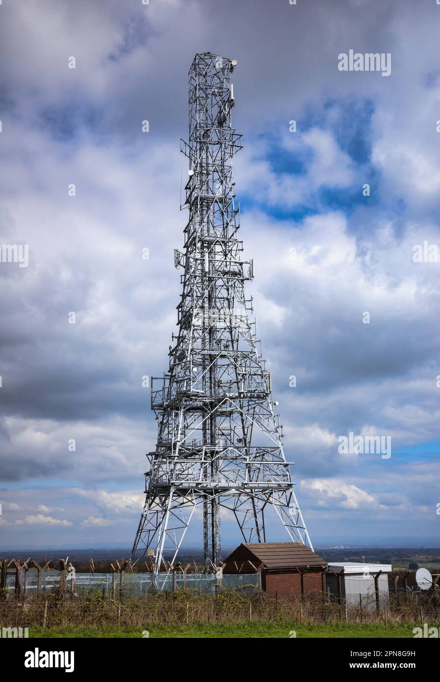 A tall metal communications tower, reaching towards the sky Stock Photo - Alamy