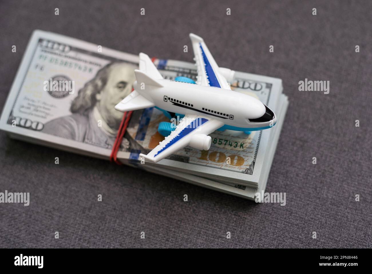 Model plane, airplane, money. Flat lay design Stock Photo - Alamy