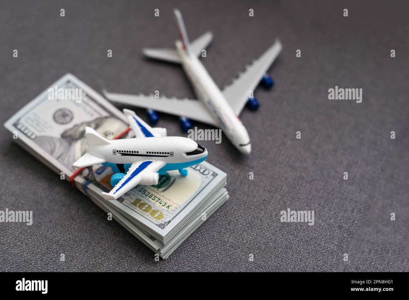Model plane, airplane, money. Flat lay design Stock Photo - Alamy