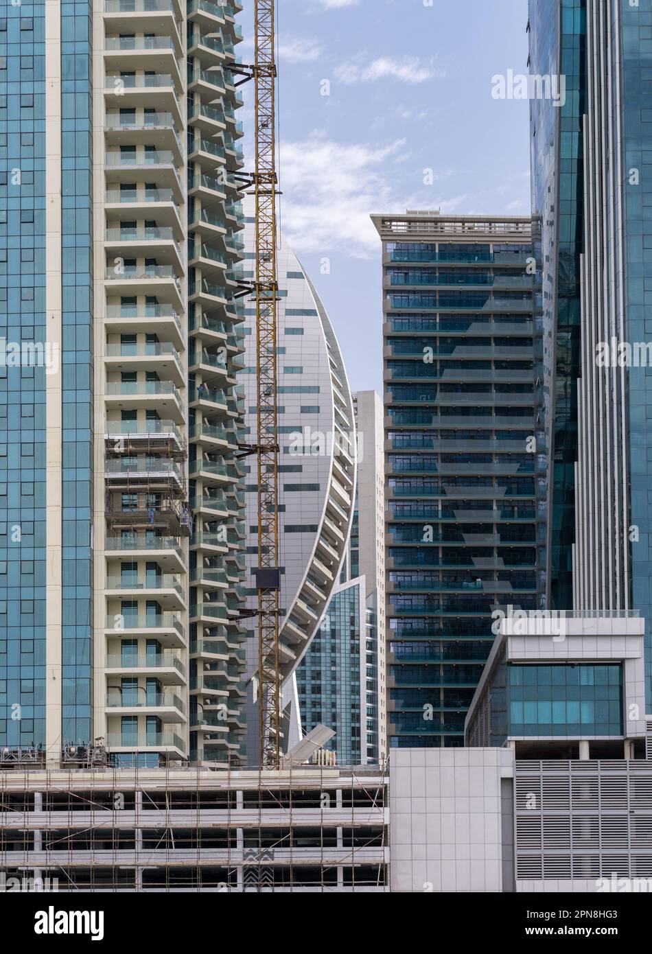 Detail of the facades of apartment blocks and towers in the Business ...