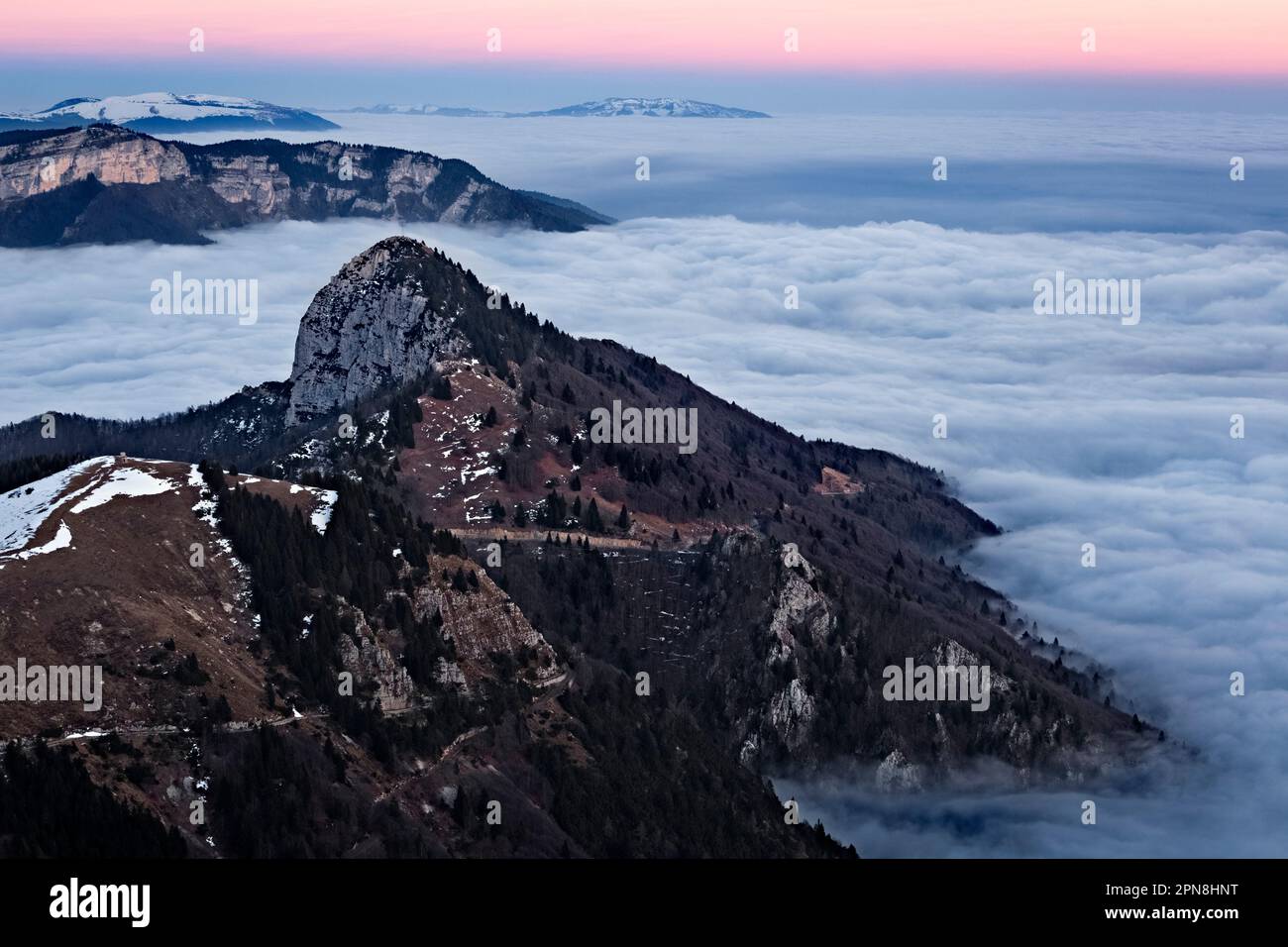 Mount Spitz di Tonezza emerges from the mists that cover the Venetian ...