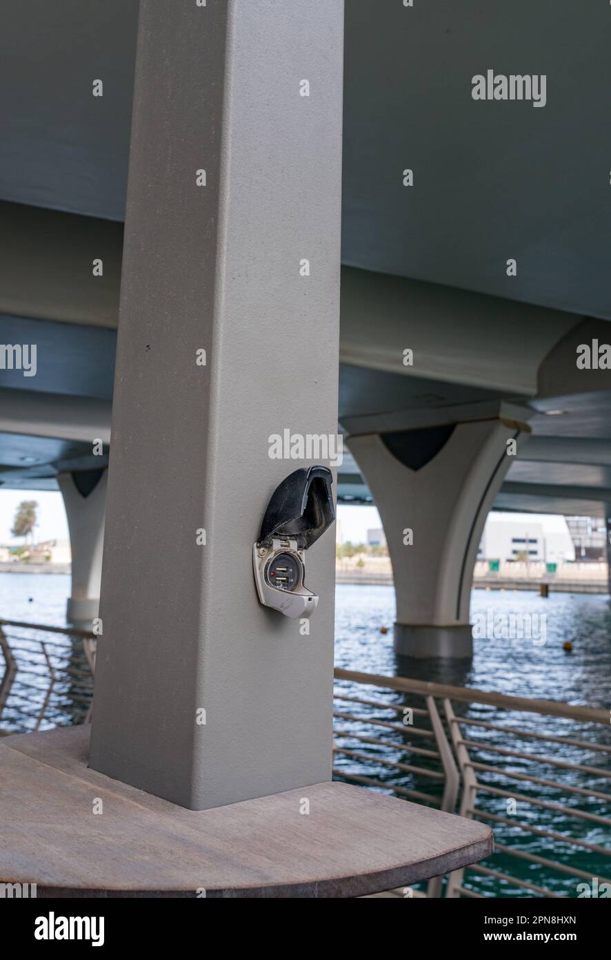 Charging point for USB devices and phones on the cycle track along the ...