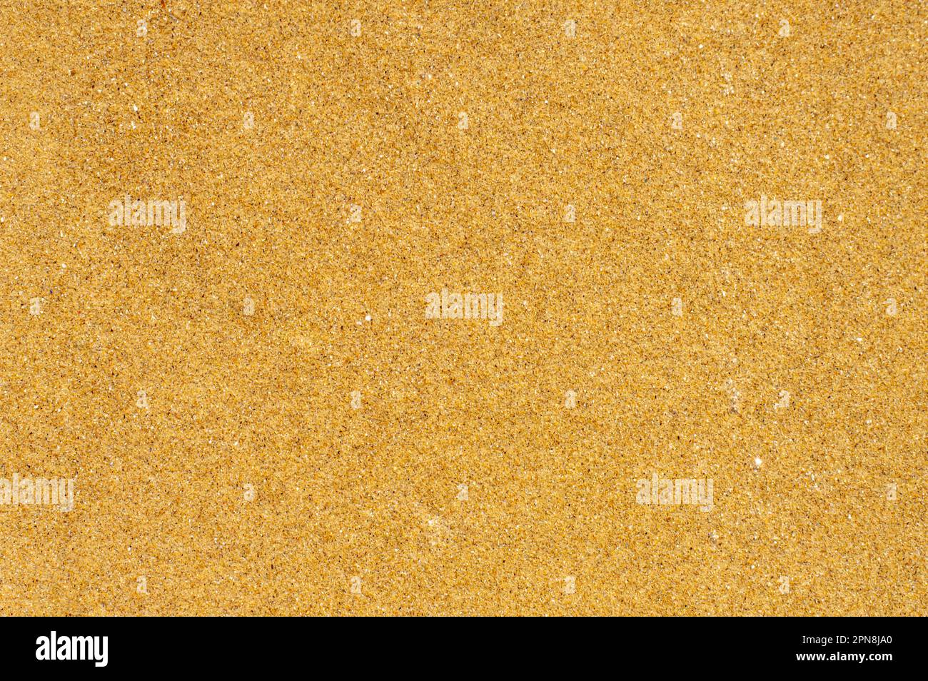 Gold sand background, nature materials, close-up Stock Photo - Alamy