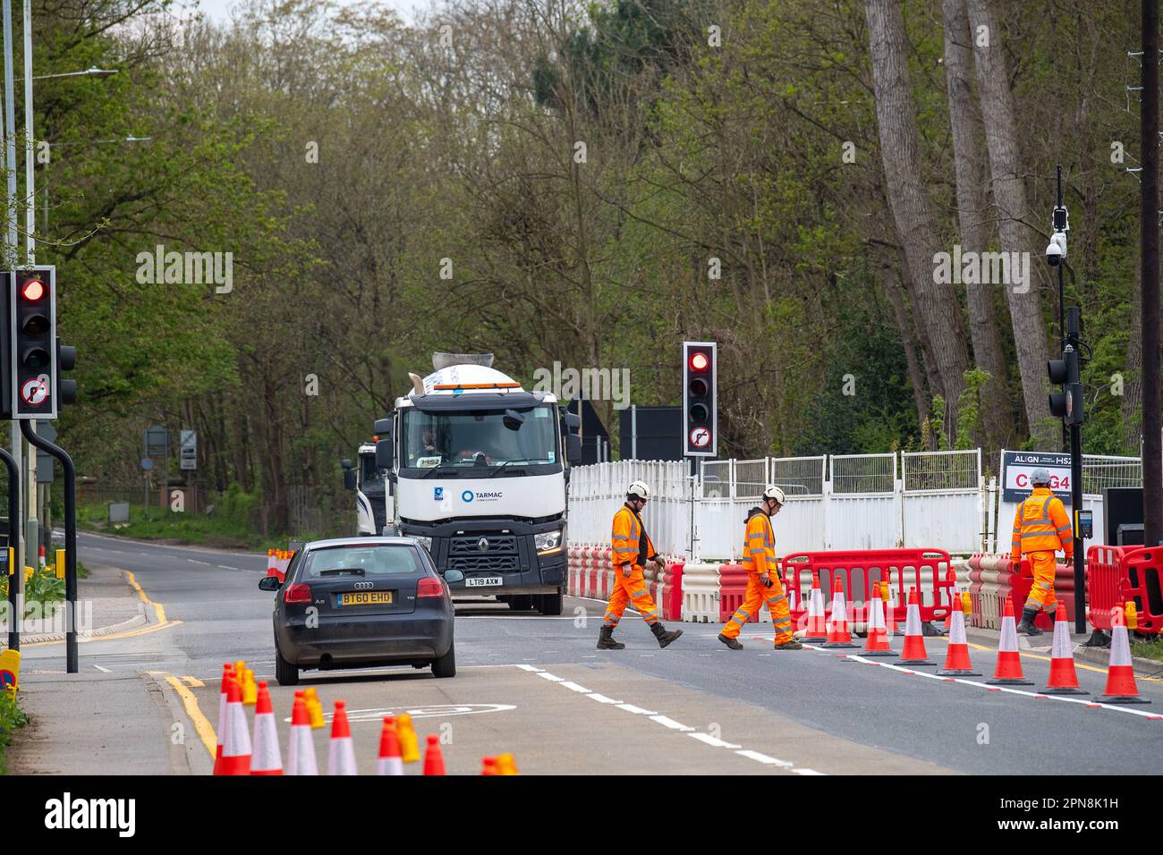 Harefield, UK. 17th April, 2023. HS2 workers crossing the road into the ...